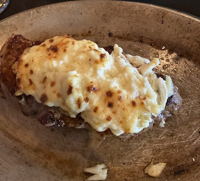 Seafood meets luxury in this crab imperial topped steak. It's like the ocean and pasture had a delicious summit meeting on your plate.