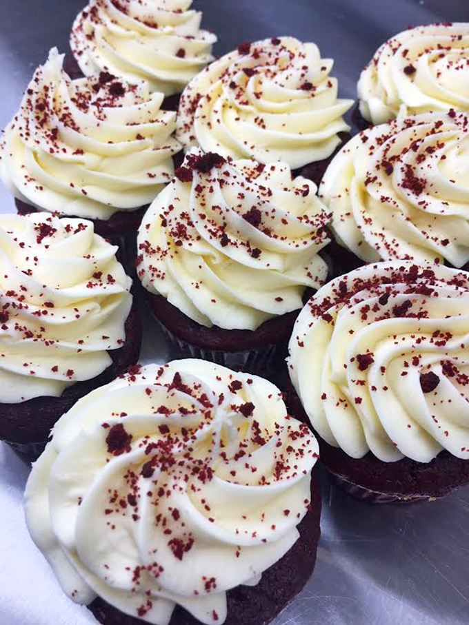 Red velvet cupcakes with cream cheese swirls that would make even the most dedicated dieter whisper, "Worth it."