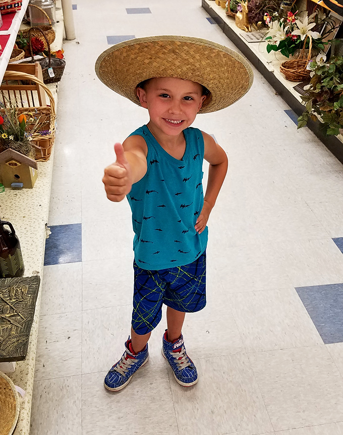 Thrift store magic happens when you find the perfect oversized hat that makes you feel like you're starring in your own adventure movie.