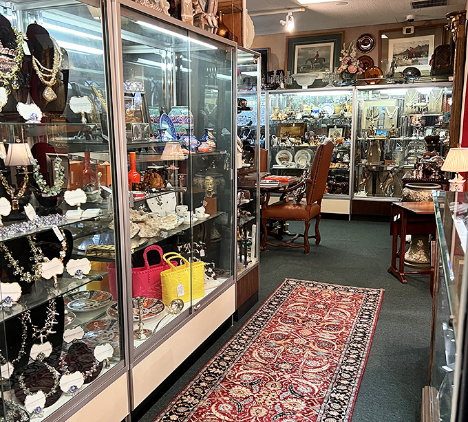 Glass cases protecting memories and masterpieces alike&mdash;jewelry and collectibles waiting for their next chapter in someone's home story.