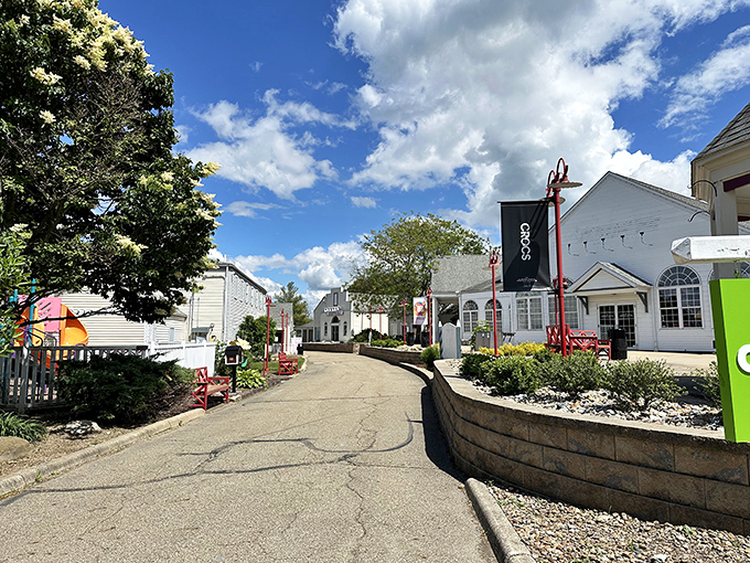 Winding pathways lined with carefully maintained landscaping guide shoppers between buildings housing fashion's biggest names.