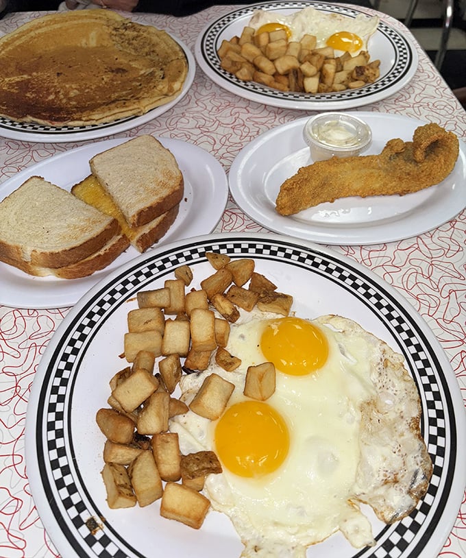 A breakfast spread that would make Ron Swanson weep with joy&mdash;eggs, potatoes, toast, and perfectly browned sausage links.
