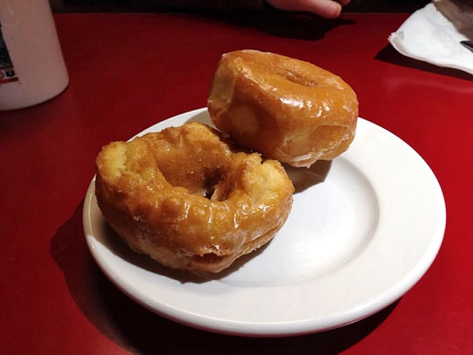 Golden perfection times two. These glazed donuts aren't just breakfast, they're edible sunshine that somehow makes Monday mornings slightly less traumatic.