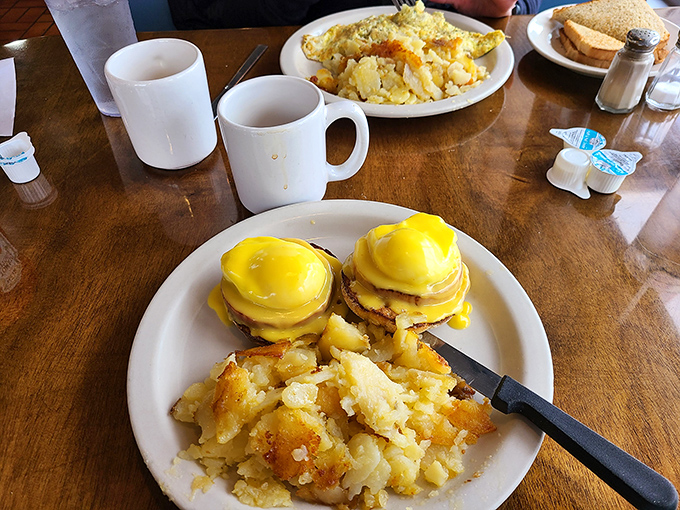 Eggs Benedict that belongs in the breakfast hall of fame. Those golden yolks are ready to create the sauce that dreams are made of.