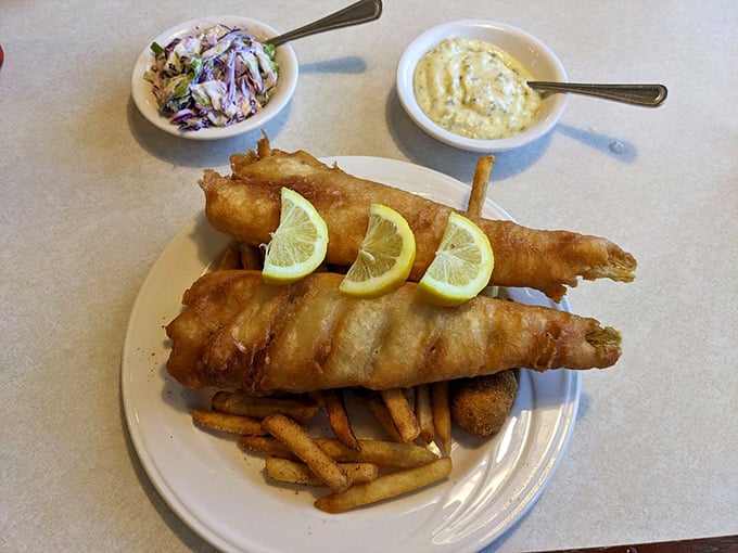 Golden-battered fish that would make Neptune himself swim to shore, served with fries that achieve that perfect crisp-to-fluffy ratio.