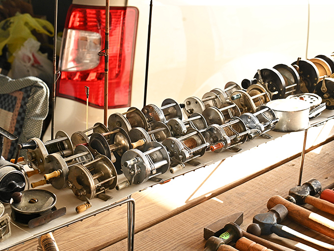 Fishing reels lined up like soldiers awaiting deployment. Each one holds stories of "the one that got away."