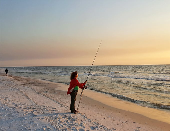 Fishing at sunset isn't just about catching dinner&mdash;it's therapy. This angler knows the real catch is the moment itself.