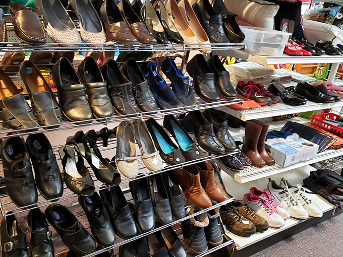 The footwear section: where sensible loafers mingle with statement boots, each pair whispering tales of dances danced and miles walked before finding their way here.
