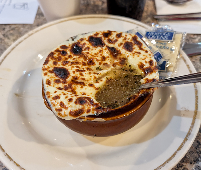 French onion soup with a cheese cap so perfectly browned, it deserves its own Instagram account and modeling contract.