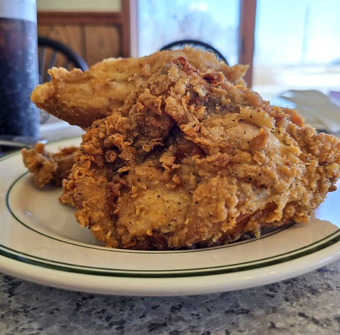 Golden, crackling perfection that makes you wonder why anyone bothers with fast food chicken when this crispy revelation exists.