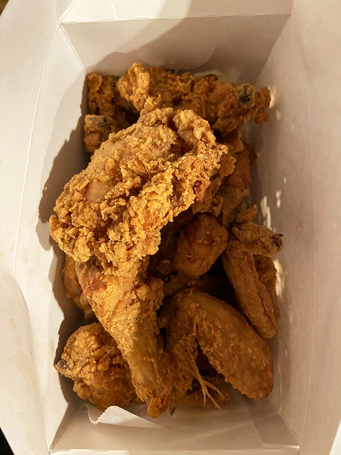 Treasure in a takeout box. Each piece of this golden-battered chicken is like finding the Hope Diamond, only tastier and significantly more affordable.