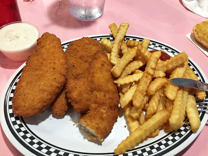 The golden-brown armor on this fried chicken doesn't just crunch&mdash;it serenades. Those crinkle-cut fries are the perfect backup singers.