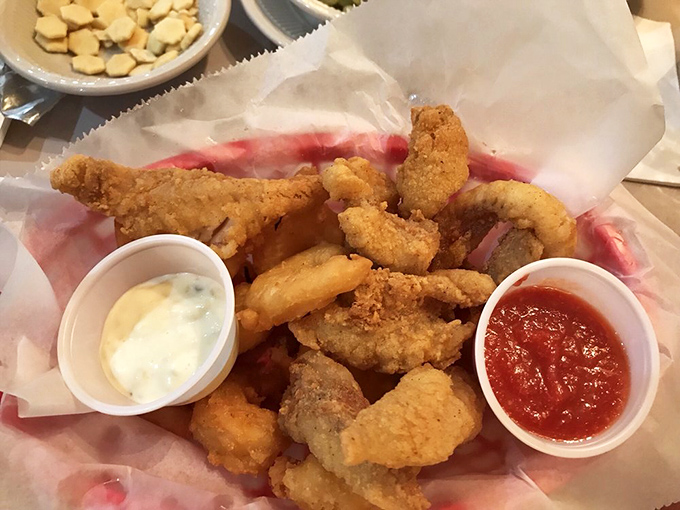Golden-fried seafood that crackles with each bite, served with dipping sauces that make you wonder why you'd eat fish any other way.