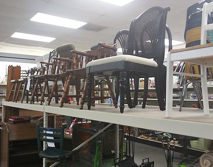 The furniture section resembles a living room lineup where cream sofas and burgundy armchairs wait patiently for their second act in someone's home.
