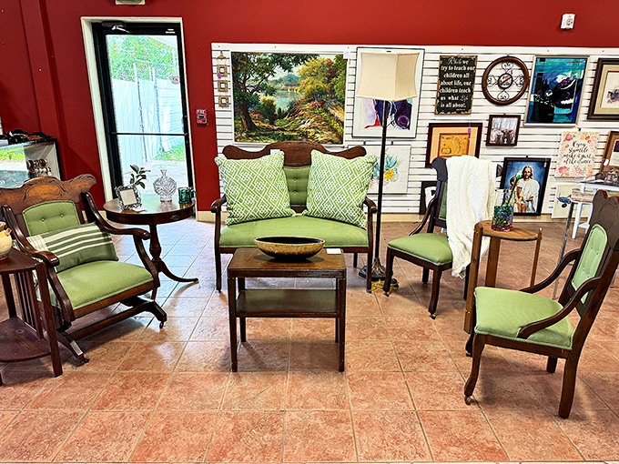 Mid-century meets modern in this perfectly staged living room vignette. That green upholstery? Pure retro heaven.