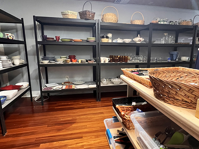 Dish paradise! These neatly organized shelves of glassware and ceramics are a entertainer's dream and a collector's treasure hunt all in one.
