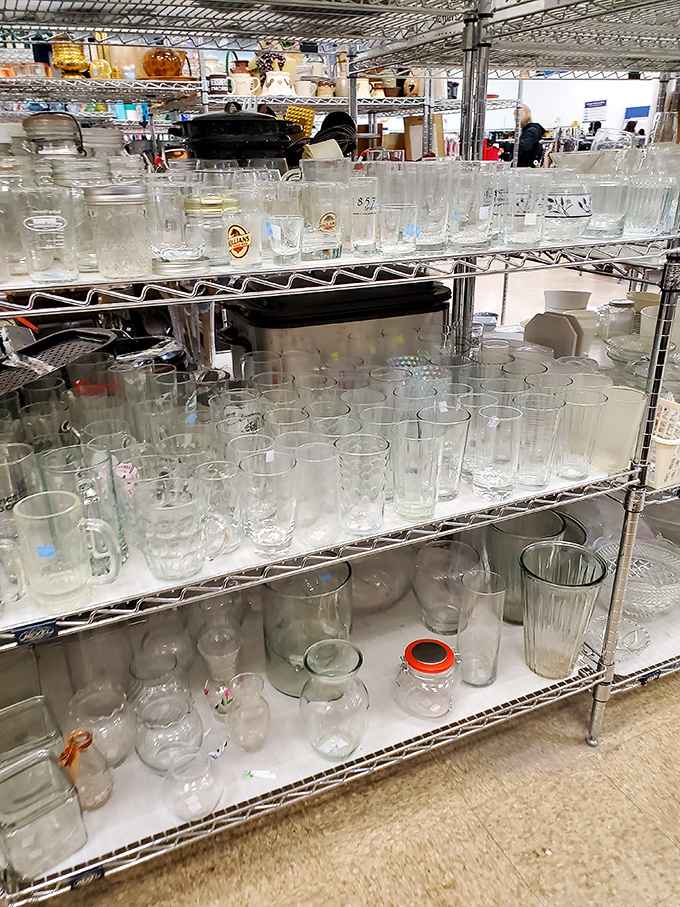 Glassware galore! Grandma's china patterns mingle with corporate logo tumblers in this democratic display of drinking vessels from across the decades.