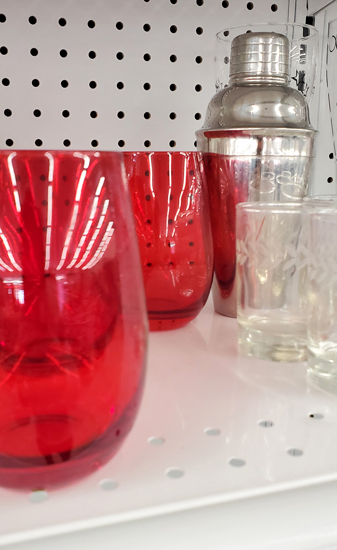 Ruby red glassware and vintage barware await their encore performance at your next dinner party. Martini, anyone?