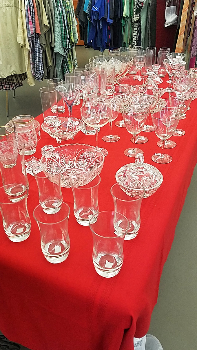 Crystal and glassware that would make your grandmother proud, displayed on eye-catching red tablecloths that highlight each sparkling piece.
