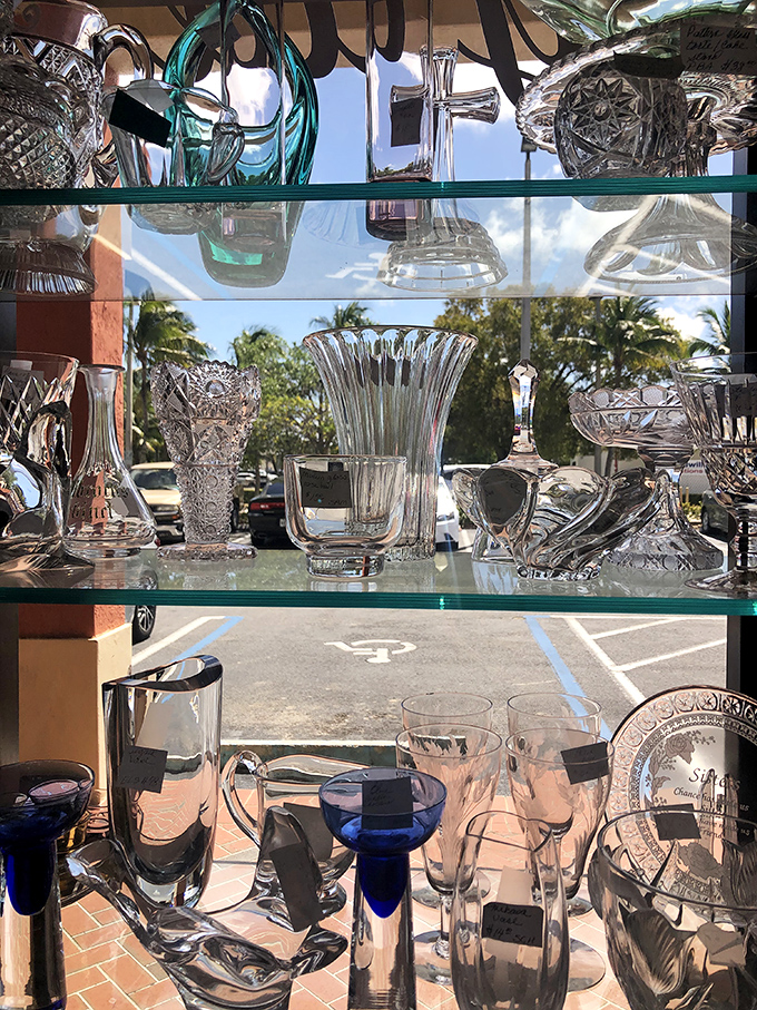 Sunlight streams through crystal and glass, creating a prism effect that would make even the most practical shopper pause in wonder.