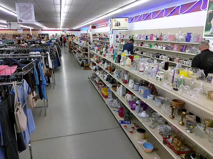 Glassware alley: where your grandmother's punch bowl meets corporate logo mugs from businesses long extinct. Crystal and kitsch, side by side.