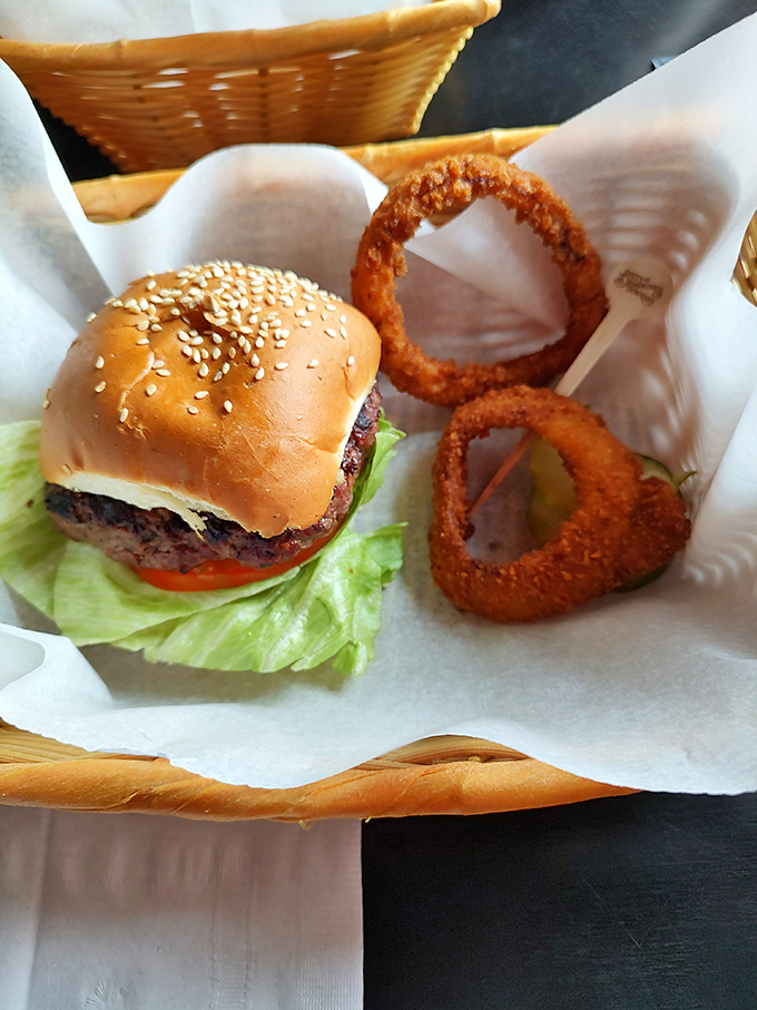 The classic American burger, elevated to art form. That sesame seed bun deserves its own Instagram account.