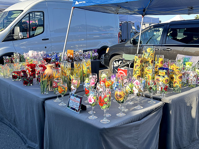 Fancy wine glasses displayed on folding tables &ndash; because elegance doesn't always require a fancy showroom.