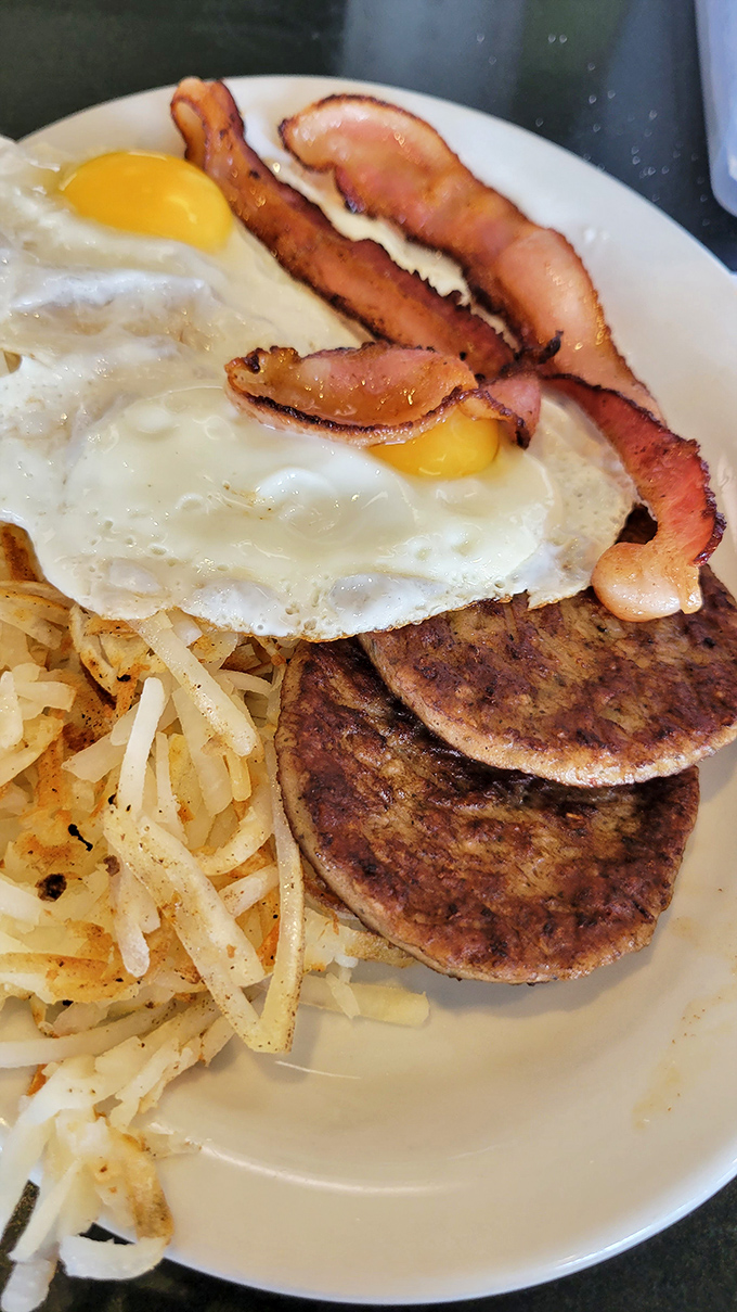 Breakfast champions rejoice! Crispy bacon, sunny-side-up eggs, and hash browns&mdash;the holy trinity of morning perfection.