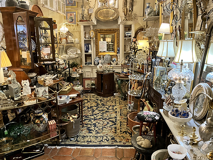 A chandelier hanging over vintage clothing? It's like Downton Abbey and Woodstock had a retail baby.