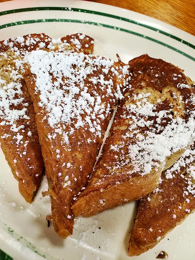 French toast that makes you question why anyone would ever eat anything else for breakfast. Powdered sugar snowfall included at no extra charge.
