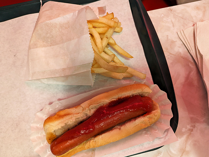 The hot dog and fries combo&mdash;America's culinary love language, spoken fluently at Burky's with no pretension, just delicious execution.