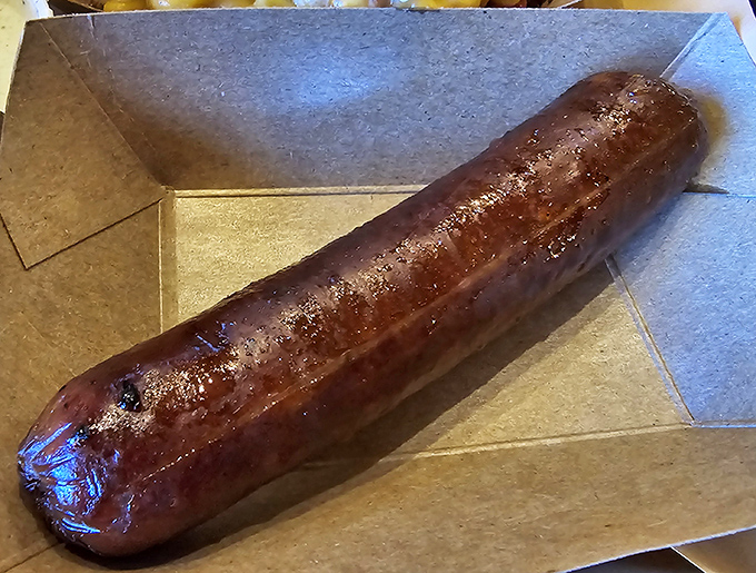 This isn't just any sausage—it's Andouille with attitude, sporting a snap that announces itself with each bite.