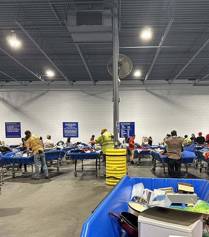 The thrill of the hunt in action &ndash; shoppers strategically positioned around blue bins, each focused with the intensity of gold miners panning for that perfect nugget.