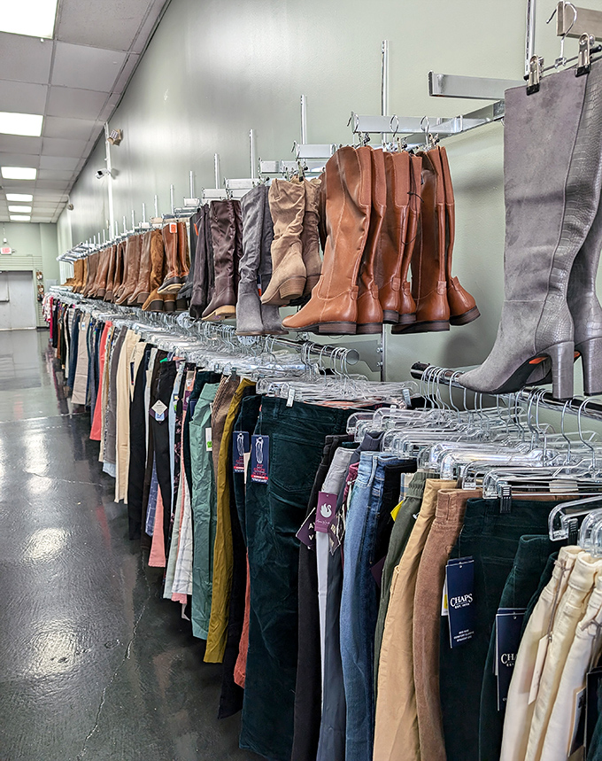 Boot boulevard meets denim drive—where else can you find knee-high leather boots displayed with the reverence they deserve, all at thrift store prices?