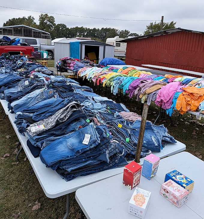 Denim heaven! Rows of pre-loved jeans and vibrant shirts create a textile rainbow &ndash; proof that fashion treasures don't need designer price tags.