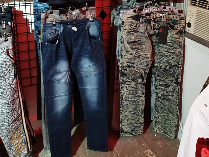 Denim dreams hanging in wait. One person's "too distressed" is another's "perfectly broken in" at the fashion roulette of the flea market.
