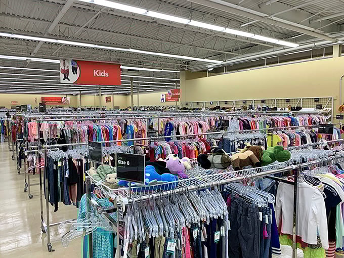The kids' section: where tiny clothes hang in colorful rows and stuffed animals silently plead, "Take me to your children!"