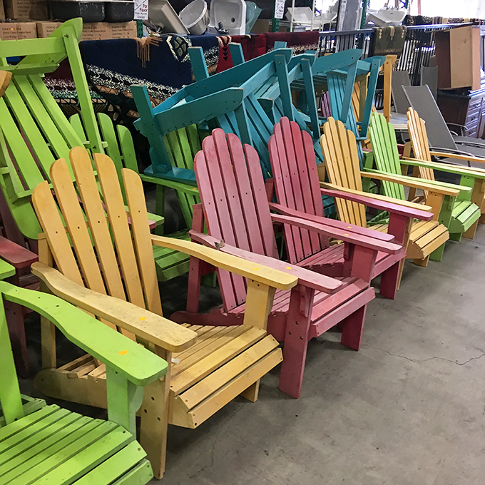A rainbow of lawn chairs stands at attention—summer's calling card in candy colors that would make your backyard the envy of the block.