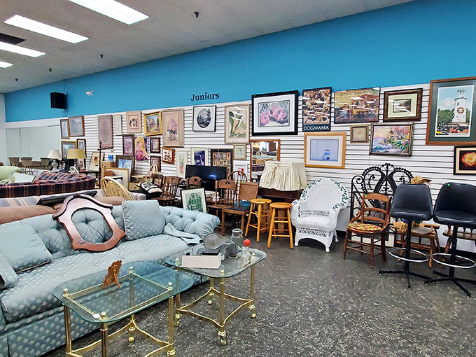 A living room vignette that spans decades of design. The mint blue sofa paired with brass and glass coffee table screams "I have excellent taste on a budget."