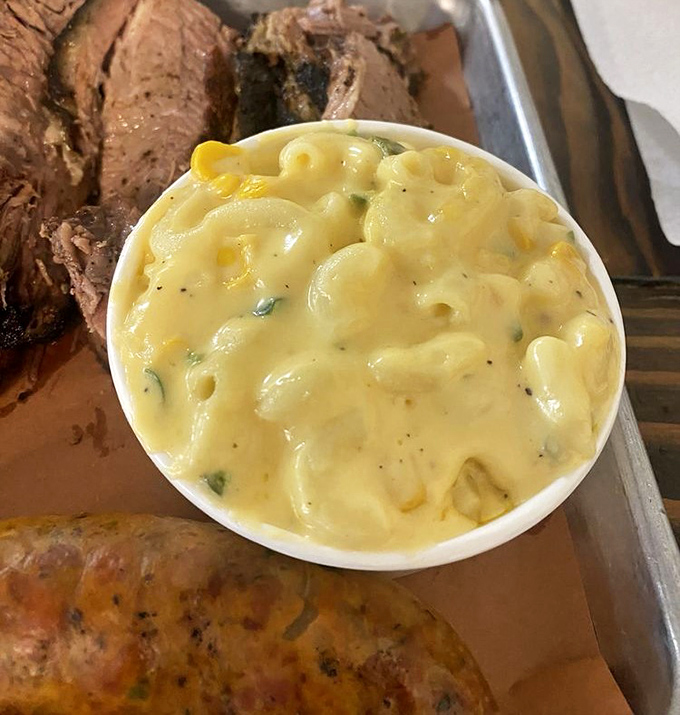 Mac and cheese that's achieved the perfect consistency: not soup, not concrete, but that elusive middle ground where cheese becomes an art form.