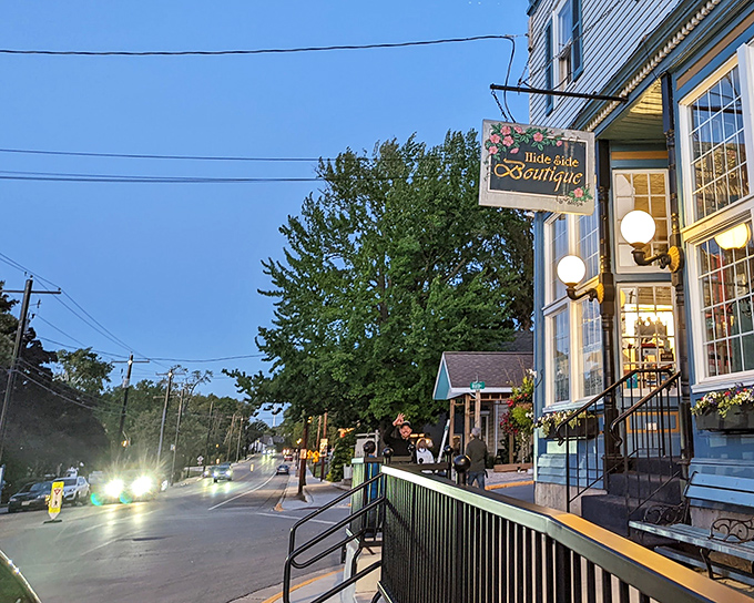As evening approaches, Hide Side Boutique glows with invitation. In Fish Creek, even window shopping feels like an authentic local experience.
