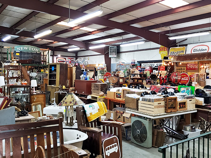 Navigate through aisles where vintage Coca-Cola signs hang above furniture treasures&mdash;like a department store designed by history buffs.