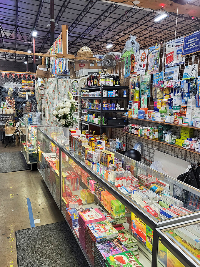 A pharmacy's worth of products neatly arranged on shelves. From headache remedies to beauty supplies, this vendor has your everyday needs covered.