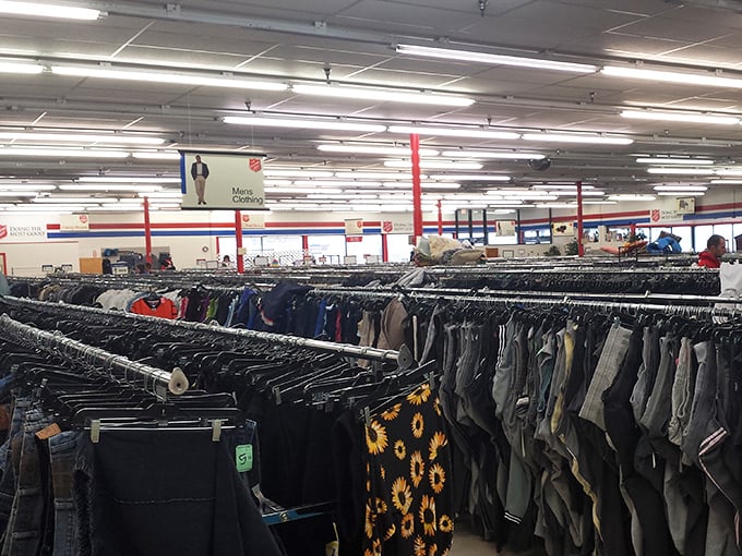 The men's department: where dress shirts that once attended important meetings now hang hopefully, dreaming of second careers at backyard barbecues.