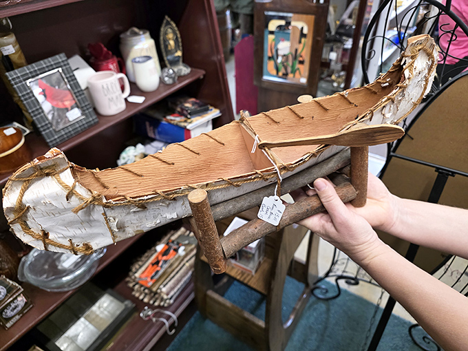 Handcrafted miniature birch bark canoe&mdash;because someone's grandfather had skills that would make Pinterest weep with inadequacy.