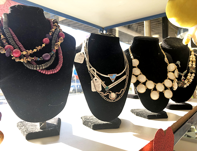 Necklaces that have seen more dinner parties than you have, each waiting for their second act on a new neckline. 