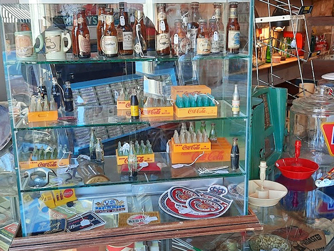 Vintage Coca-Cola bottles and advertising memorabilia&mdash;when soda came in glass and logos were works of art.