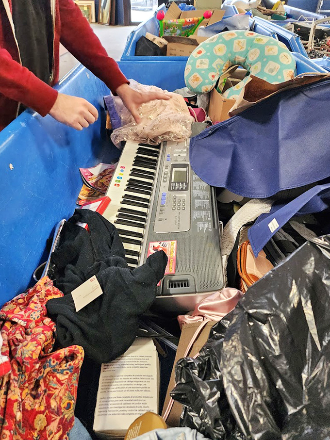 Musical discovery amid the mayhem! That keyboard might have accompanied a child's first recital or a garage band's almost-big break.