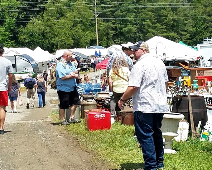 Conversations flow as easily as deals are made, with vintage Coca-Cola coolers serving as impromptu meeting spots between treasure hunts.
