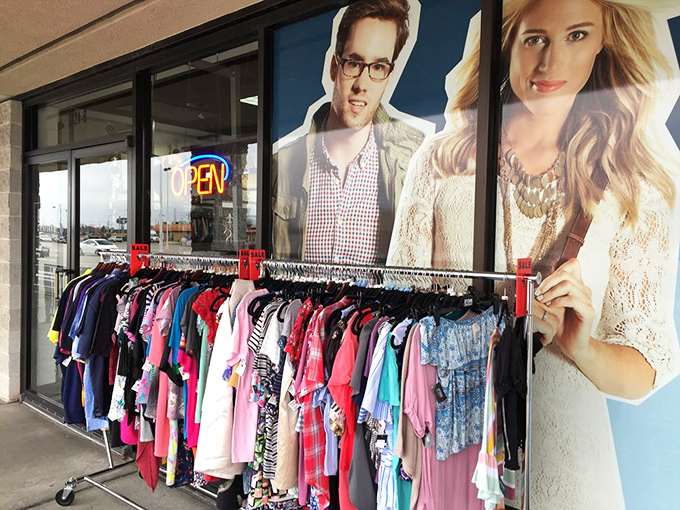 The storefront beckons with colorful clothing racks outside &ndash; like a fashion lemonade stand where the refreshment comes in fabric form.
